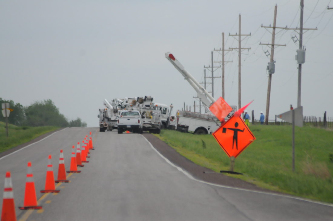 Photo gallery: Crews repair power lines on U.S. Highway 56 east of ...